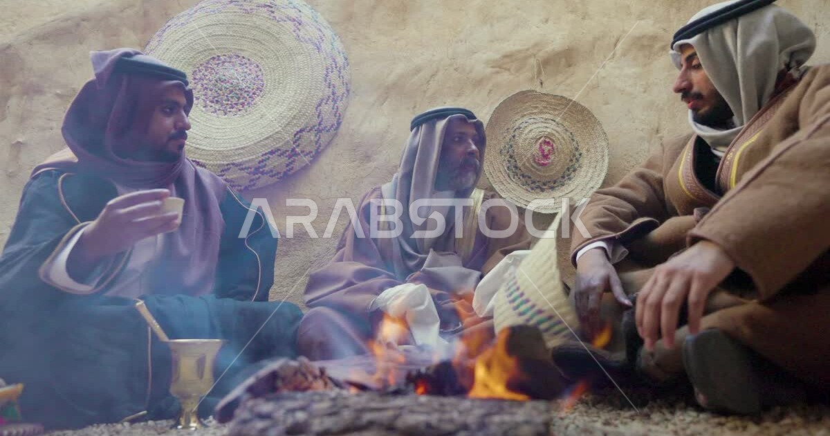A group of Saudi Arabian Gulf men sitting in the popular neighborhoods ...