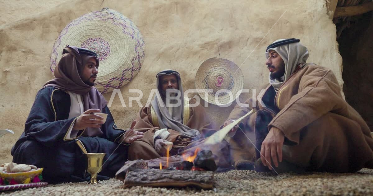 A group of Saudi Arabian Gulf men sitting in the popular neighborhoods ...