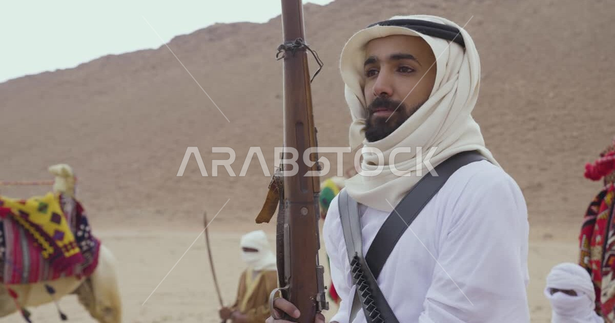 Close-up of a Saudi Arabian Gulf knight riding a horse with a ...