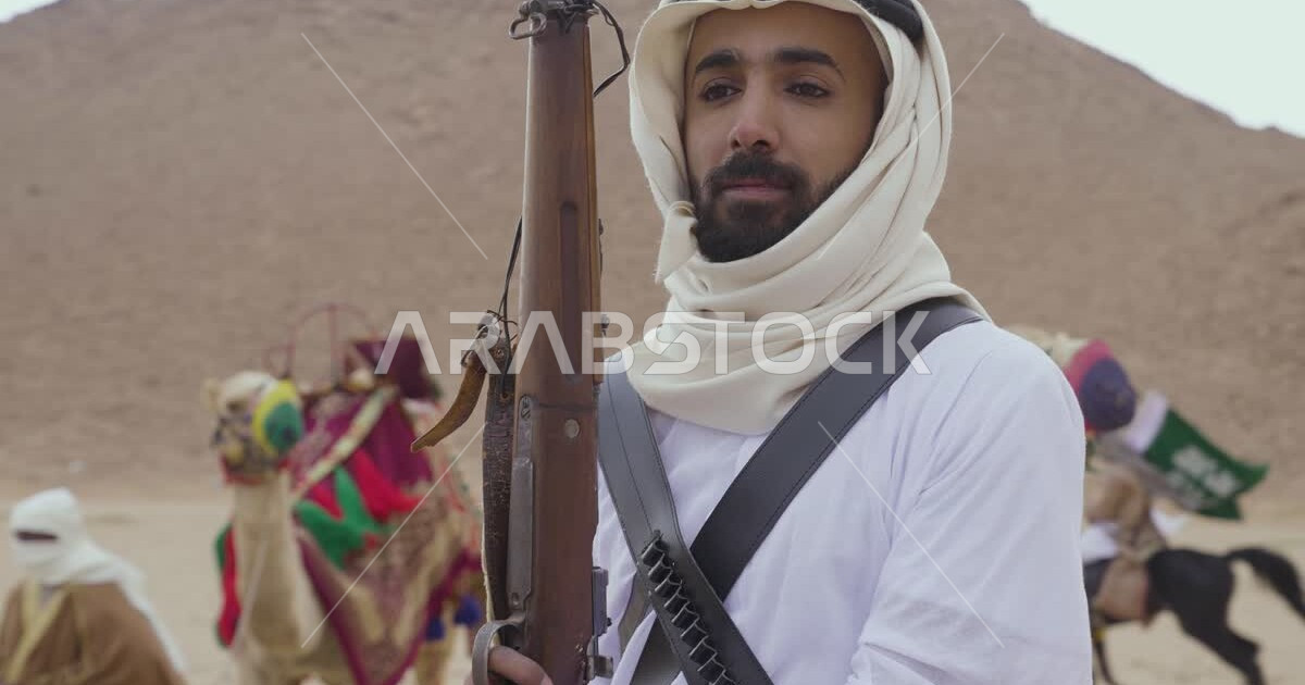 Close-up of a Saudi Arabian Gulf knight riding a horse with a ...