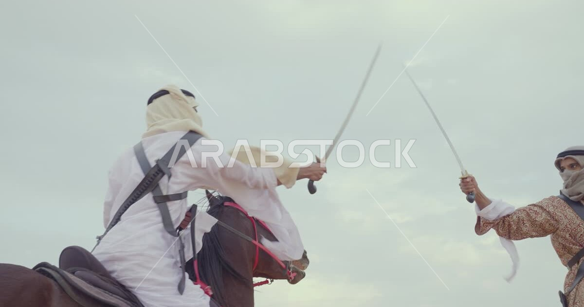 Two Saudi Arabian Gulf knights riding horses in the desert and jousting ...