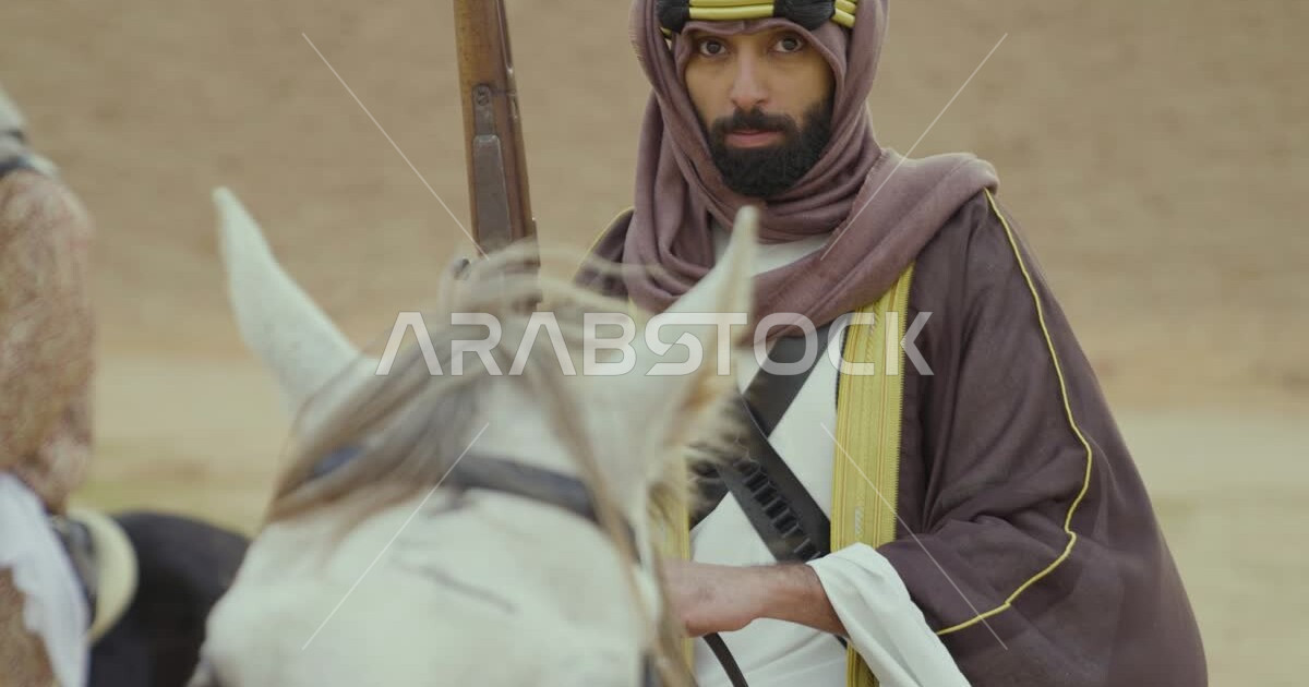 Close-up of a Saudi Arab Gulf knight wearing a traditional costume and ...