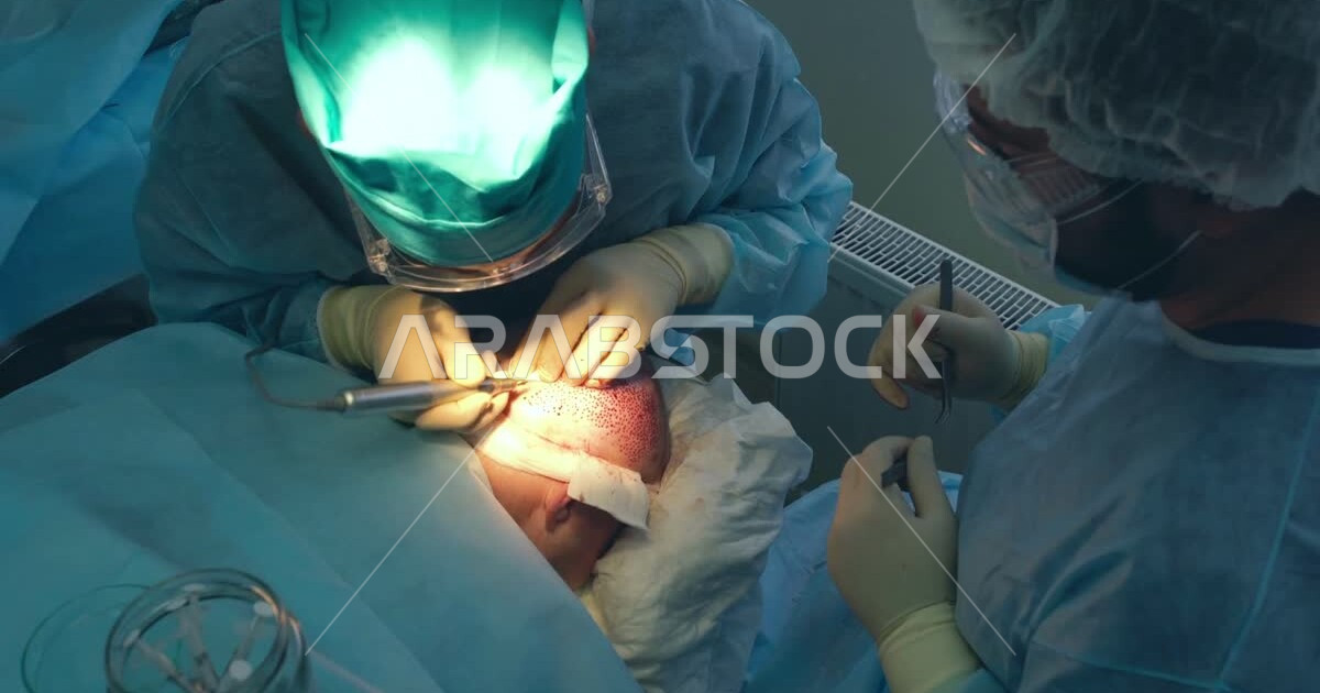 Close-up of a medical team performing a head transplant, receiving ...
