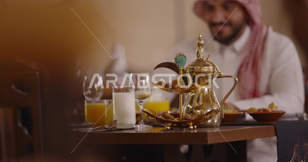 A close-up of a Saudi Arabian Gulf man at the breakfast table in the ...