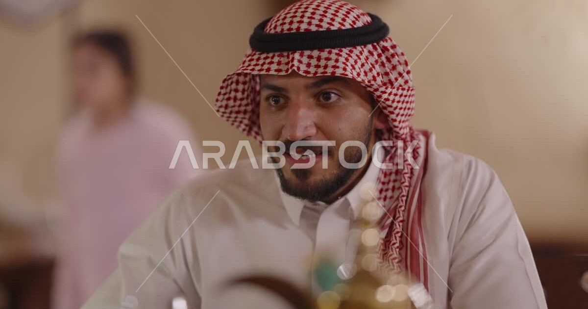 A close-up of a Saudi Arabian Gulf man at the breakfast table in the ...