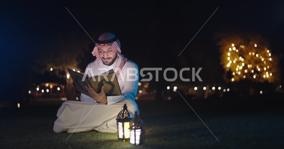 A Saudi Gulf Arab man reading the Holy Qur’an, the Holy Qur’an, Ramadan ...