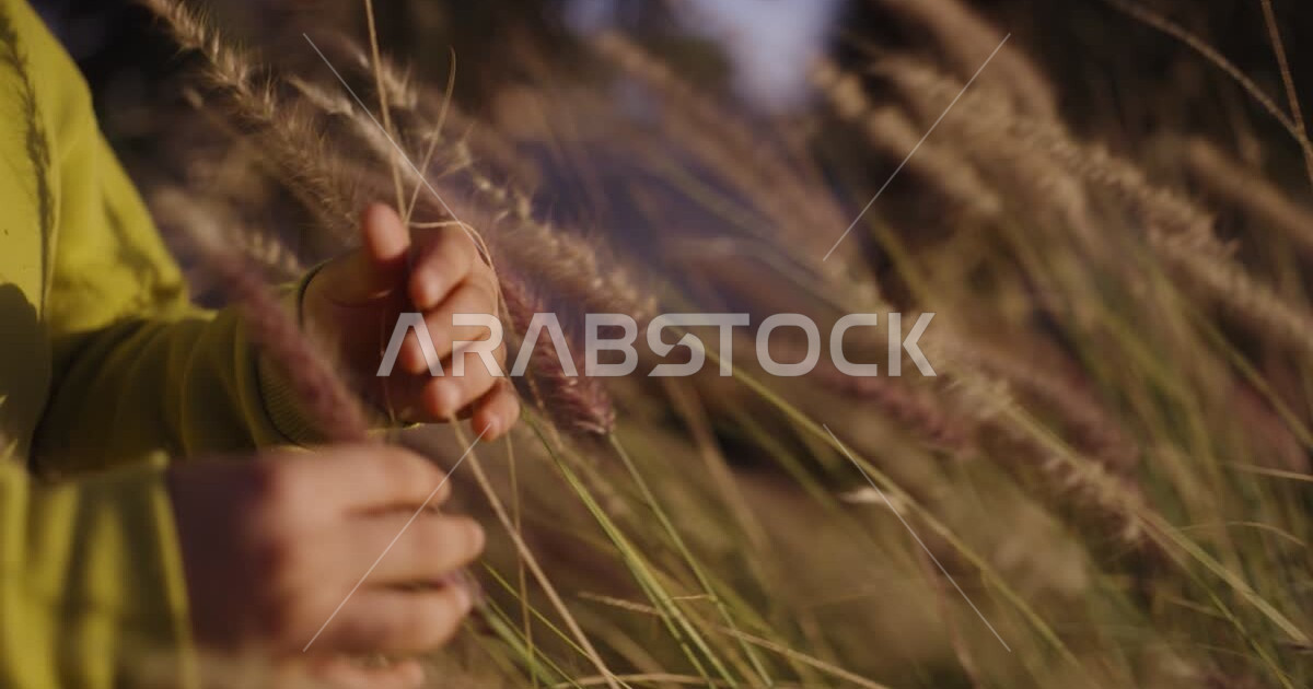 Close-up of a Saudi Arabian Gulf girl in a recreational park in the ...
