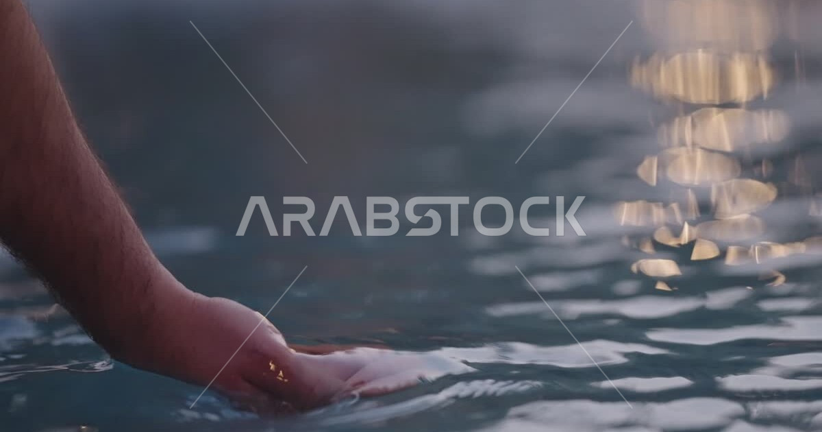 Close-up of a person's hand touching water, pond, swimming pool - Video ...