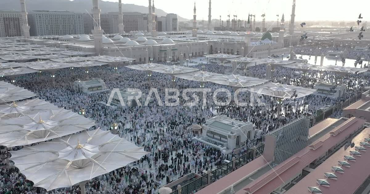 Muslims gathered in the courtyards of the Prophet’s Mosque in Madinah ...