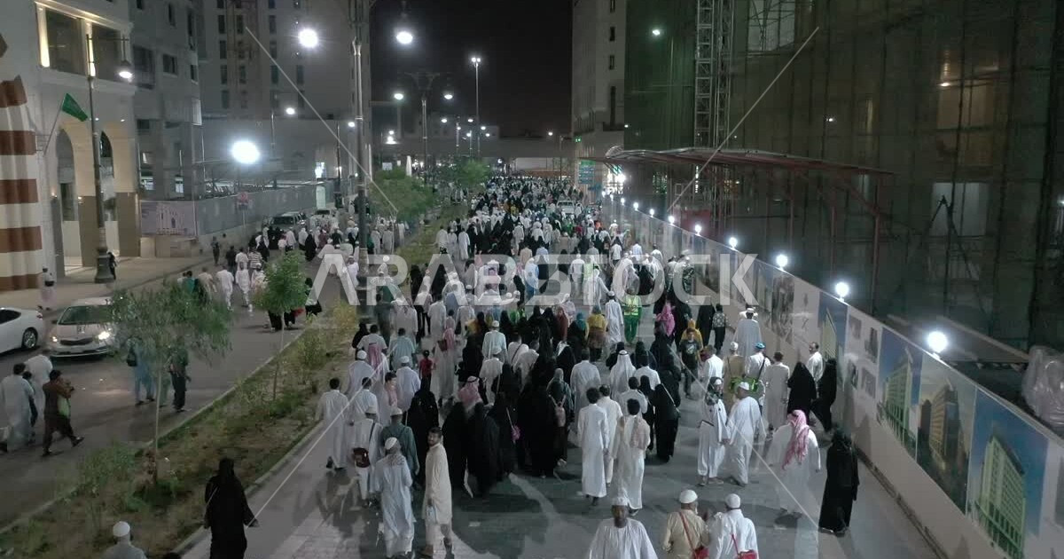 Muslims gathered in the outer complex of the Prophet’s Mosque in ...