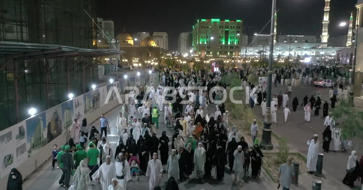 Muslims gathered in the outer complex of the Prophet’s Mosque in ...