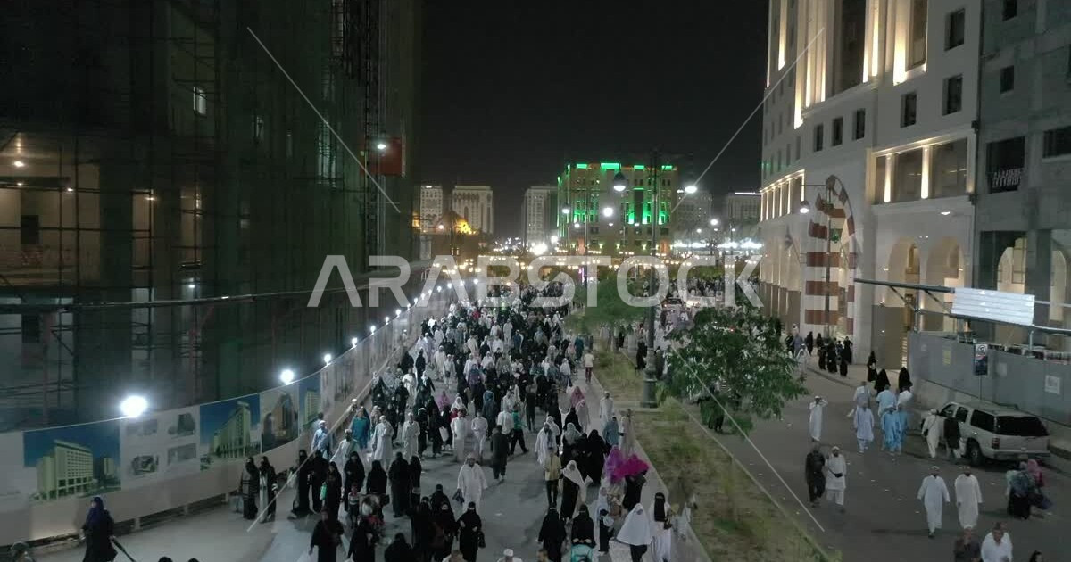 Muslims gathered in the outer complex of the Prophet’s Mosque in ...
