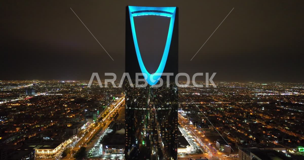 Photographing a night aerial shot of the Kingdom Tower in Riyadh, Saudi ...