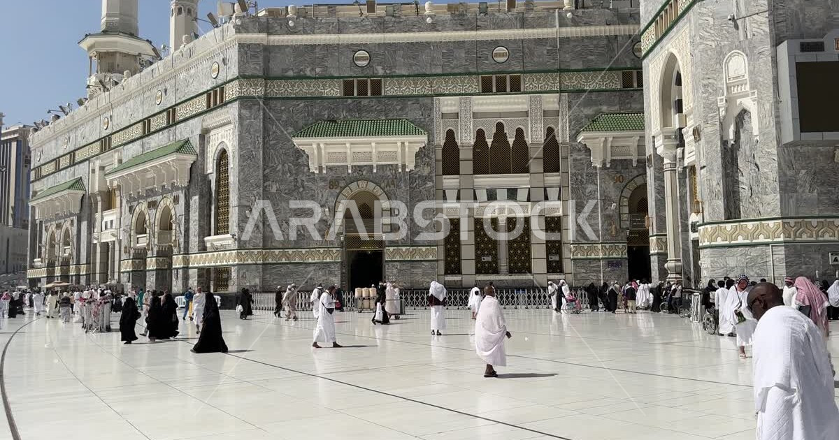 Makkah Al-Mukarramah, Saudi Arabia, worshipers and pilgrims walk in the ...