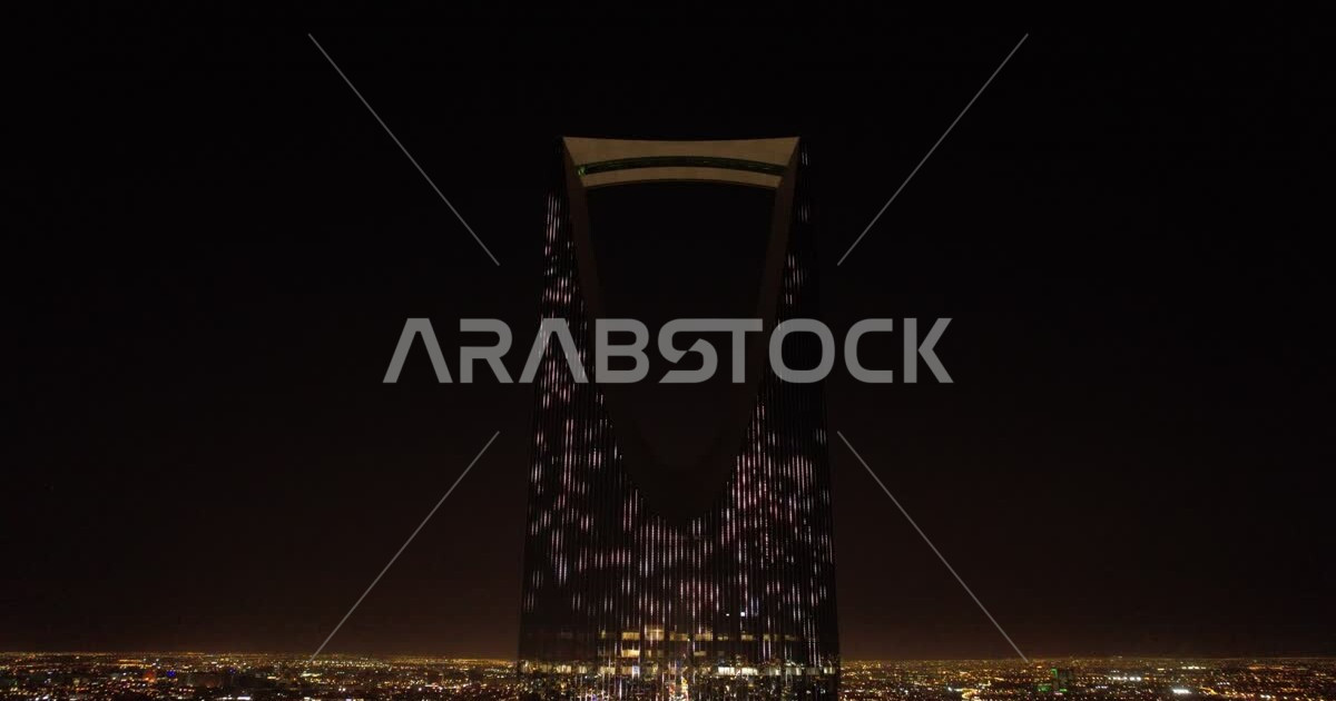 Drone aerial photography at night of the Kingdom Tower in Riyadh, Saudi ...