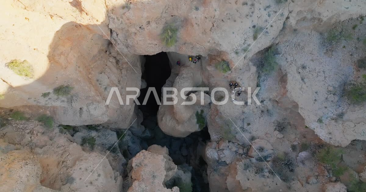 Drone photography of mountain climbers preparing to descend the Majlis ...