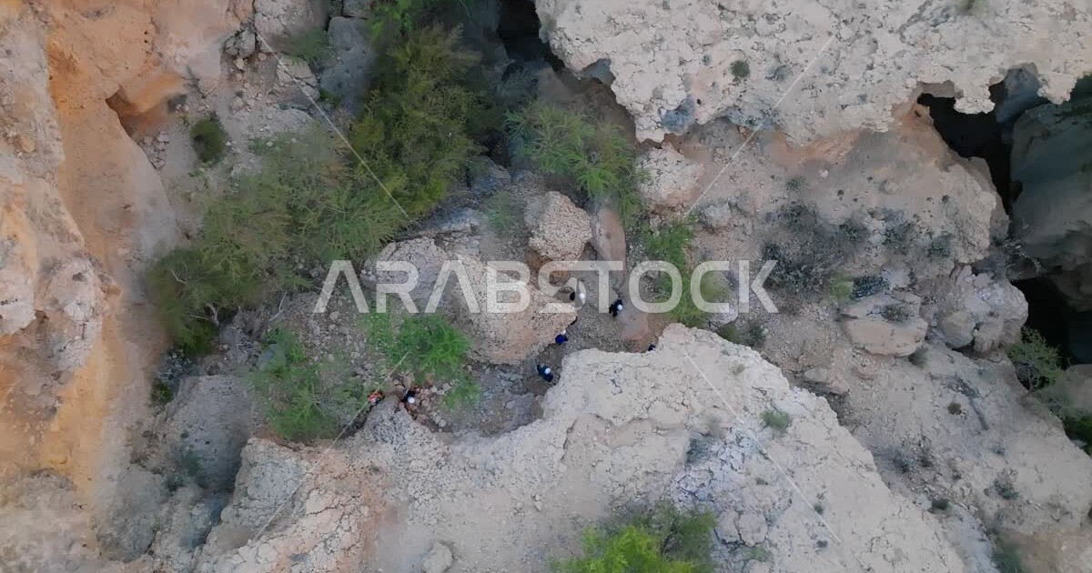 Drone climbers near Majlis al-Jinn Cave, the second largest cave in the ...