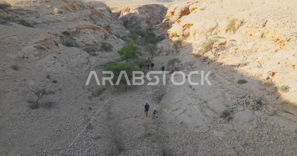 Drone photography of climbers heading to Majlis Al Jinn Cave, the ...