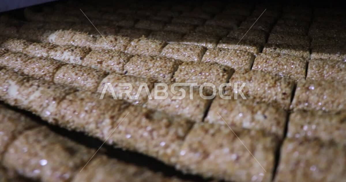 Close-up of delicious Eid pastries, fragile popular sweets, sesame date ...