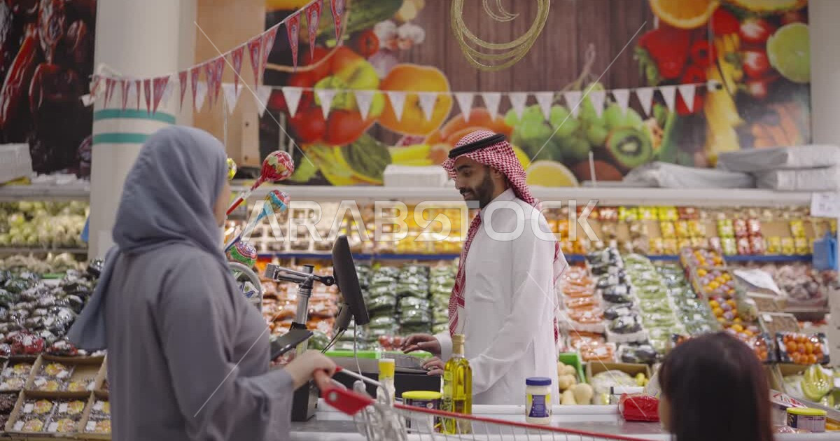 A Saudi Arabian Gulf woman in the supermarket, commodities and ...